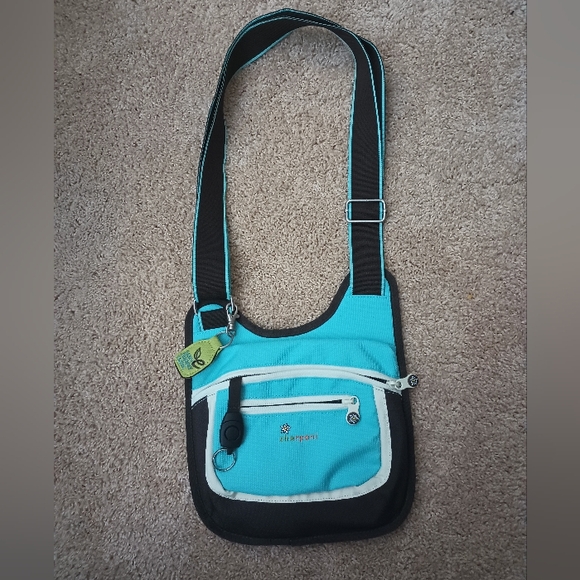 Sherpani | Bags | Sherpani Switch Crossbody Bag In Aqua And Black ...